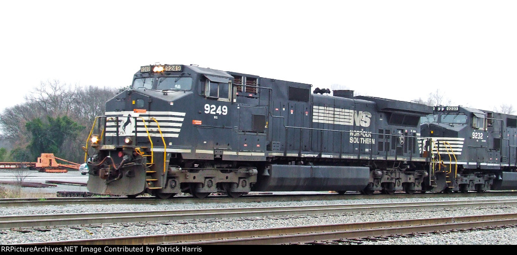 NS 9249 NS 9232 C40-9W 2690 SD70M-2 climbing upgrade northbound past the MOW prep yard from NS ...